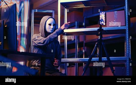 Hacker Wearing Anonymous Mask Doing Ransom Video After Gathering Information From Users