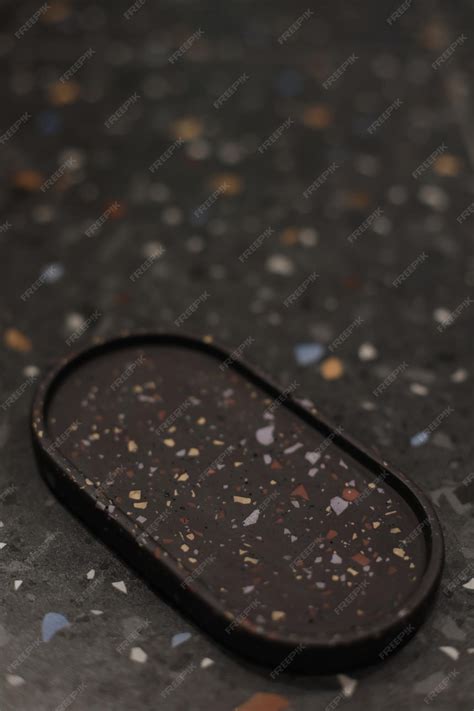 검은색 테라조 텍스처 벽지 및 배경 돌 대리석 질감 세라믹 벽 타일 프리미엄 사진