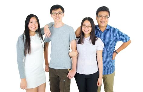Premium Photo Portrait Of Smiling Siblings Standing Against White