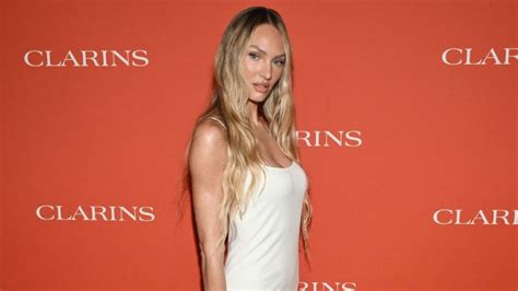 Candice Swanepoel Wraps Micro Miniskirt Around Stringy Tropic Of C