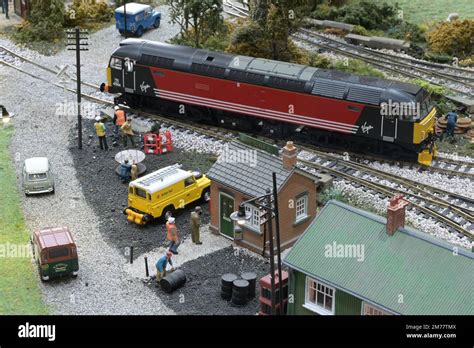Totnes Castle A Virgin Liveried Class 47 Parked By A Work Scene