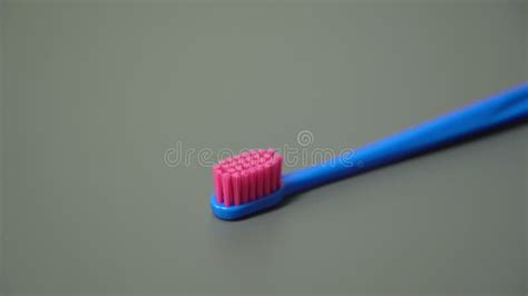 Plastic Toothbrush On Grey Background Blue And Pink Color Brush Stock