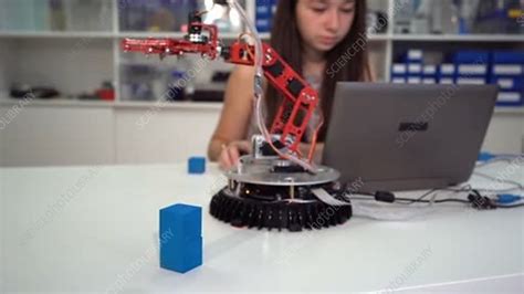 Woman Watching Robot Stock Video Clip K0078111 Science Photo Library
