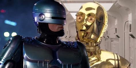 Robocop And C 3po Pose For Pregnancy Photo In Unexpected Pairing