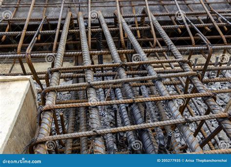 Steel Reinforcing Tie Wire Work At Construction Site Of Embankment For