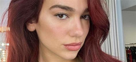 Dua Lipa Battles Late Night Humidity In Plunging Braless Dress
