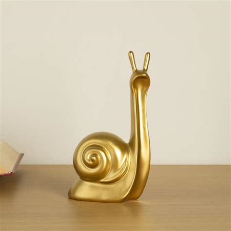 Статуетка декоративна полістоун слимак висота 21 см золото — ціна 498 грн у каталозі