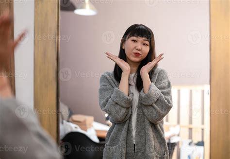 Cute Asian Korean Girl Chooses Clothes Takes Care Of Herself And Poses
