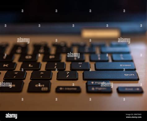 Closeup Of Laptop Keyboard Black Keys On Silver Laptop Shift Key In Focus Stock Photo Alamy