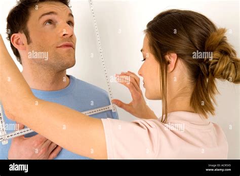 Woman Measuring Mans Face Ruler Hi Res Stock Photography And Images Alamy