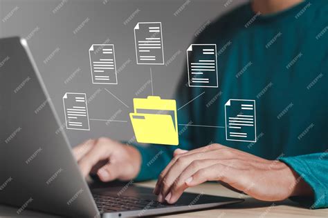 Premium Photo Businessman Using Laptop With Database On Computer To