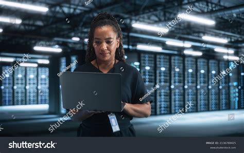 African It Specialist Using Tablet Computer In Data Center Over 8 Royalty Free Licensable Stock