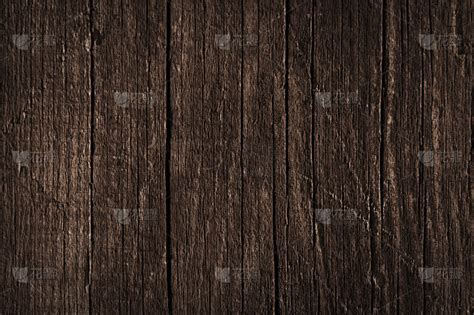 深褐色的旧粗木纹理。设计的抽象背景。复古怀旧