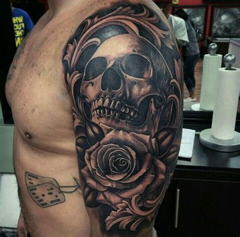Skull And Roses Shoulder Tattoo