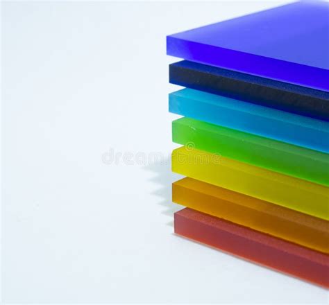 Colorful Pieces Of Matte Plexiglass On A Wooden Background Stock Image