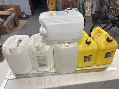 2 Fuel Tanks 4 Fluid Containers Legacy Auction Company
