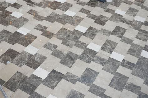 Stunning And Elegant Marble Tile Floor Design Featuring A Variety Of