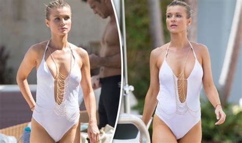 Model Joanna Krupa Suffers Unfortunate Camel Toe In Plunging Swimsuit