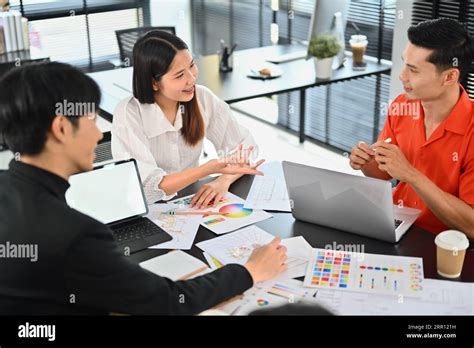 Male And Female Creative Designer Brainstorming For New Interior Design Renovation Projects At