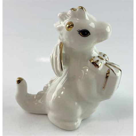 Дракон порцеляна 9 8 5 4 5 см — ціна 130 грн у каталозі Статуетки