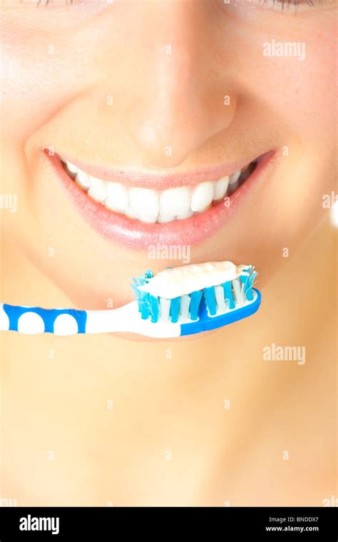 Closeup Of Woman Mouth With Tootbrush And Toothpaste On White Isolated