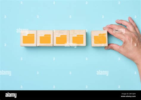 Cubes With Folder Icons On A Blue Background Data Systematization