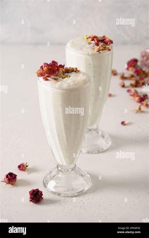 Indian Sweet Lassi With Saffron And Rose Water On White Background Vertical Format Traditional