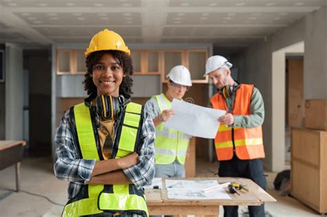 Portrait Female Engineer Project Manager With Construction Gear And