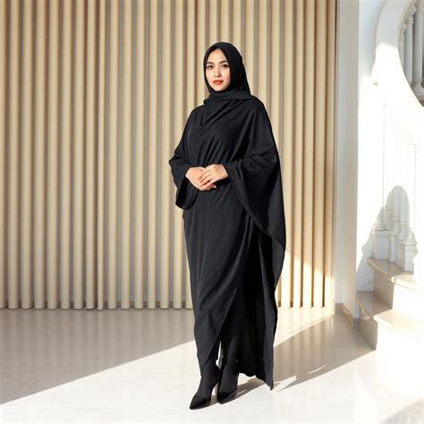 Elegance In Tradition A Woman In Black Chador