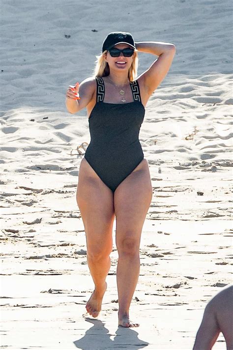 Bebe Rexha Shows Off Her Curves In A Black Swimsuit While Enjoying A