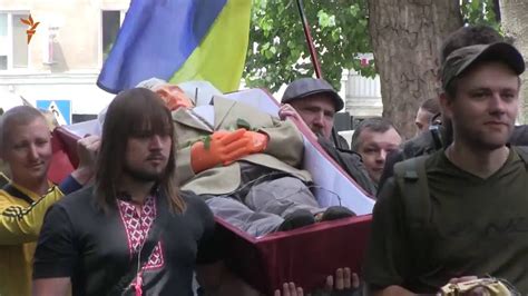 Russia Day 2016 in Ukraine. Funeral of Putin near Russian embassy ...