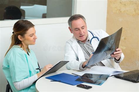 Intern Taking Notes On Xray Result Stock Image Image Of Person Specialist 197409847