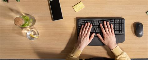 Logitech Wave Keys MK Combo Wireless Ergonomic Keyboard With Signature M L Wireless Mouse