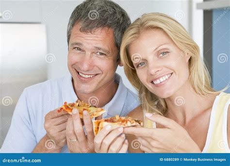 Husband And Wife Eating Pizza Stock Image Image Of Enjoying Smiling