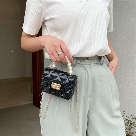 กระเป๋าสะพายไหล่ เนื้อเจลลี่ ขนาดเล็ก แบบพกพา ระดับไฮเอนด์ สไตล์ตะวันตก แฟชั่นสําหรับสตรี 2021