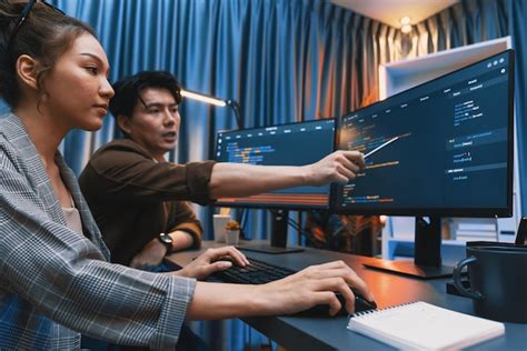 Premium Photo It Developers Discussing With Point Website Coding System Infobahn