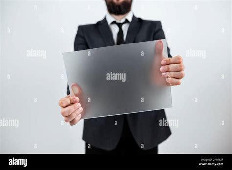 Male Professional Holding Blank Placard And Displaying Business Data Businessman Wearing Suit