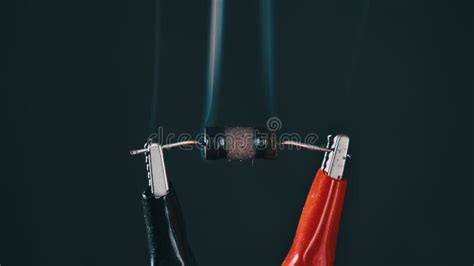 The Resistor Heats Up With Smoke Under A High Electric Current Short