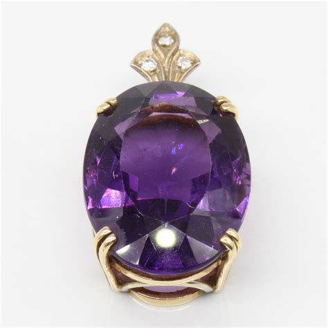 Cavelti Garnet And Diamond Pendant 10ct 014ctw