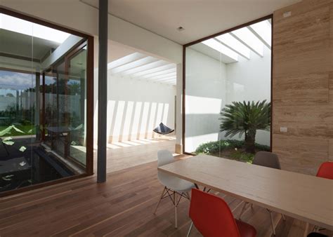 House Of Eight Gardens Is Built Around Open Air Courtyards