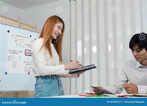 Creative Team Collaboration On Ux Ui Design Project In Modern Office