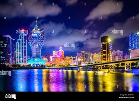 Macau Cityscape At Night All Hotel And Tower Are Colorful Lighten Up