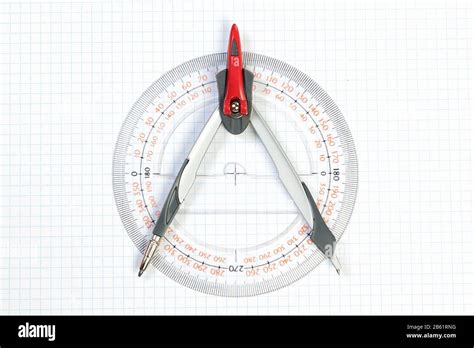 Tools For Plotting Compass And Protractor On A White Background Stock