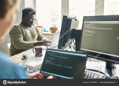 Programmers Working Office Desk Laptops Writing Codes New Software