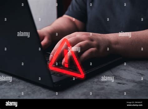 Woman Use Laptop With Hologram Warning Sign For Notification Error