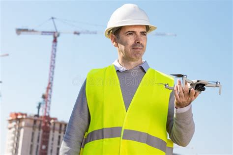 Man Launches A Quadcopter Stock Photo Image Of Industrial 261205660