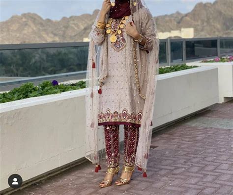 الزي العمانيي𖠌