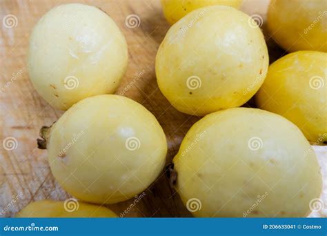 Fresh Yellow Guavas Isolated On A Wooden Table Stock Image Image Of