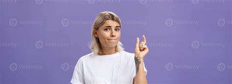 Girl Having Tiny Problem Concerned Attractive Blonde Girl With Tattoo On Arm Pursing Lips In