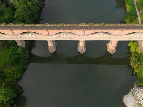 Ney And Partners Curves Footbridge Between Arches Of French Viaduct